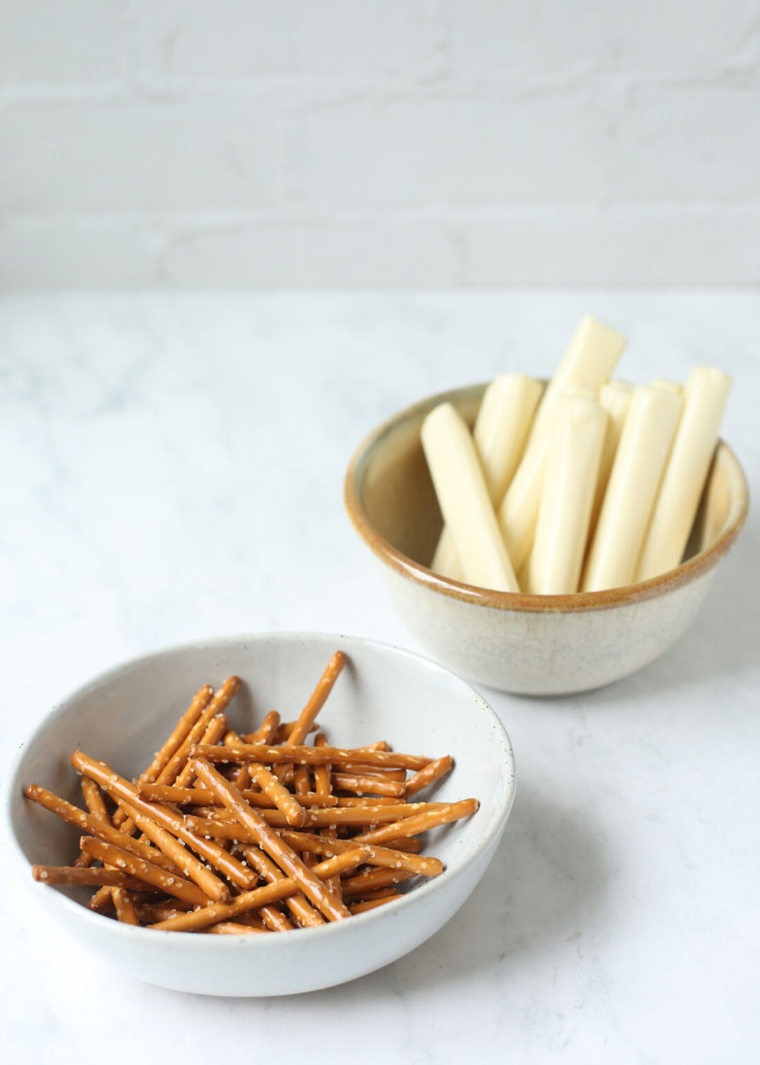 String Cheese Pretzel Broomsticks