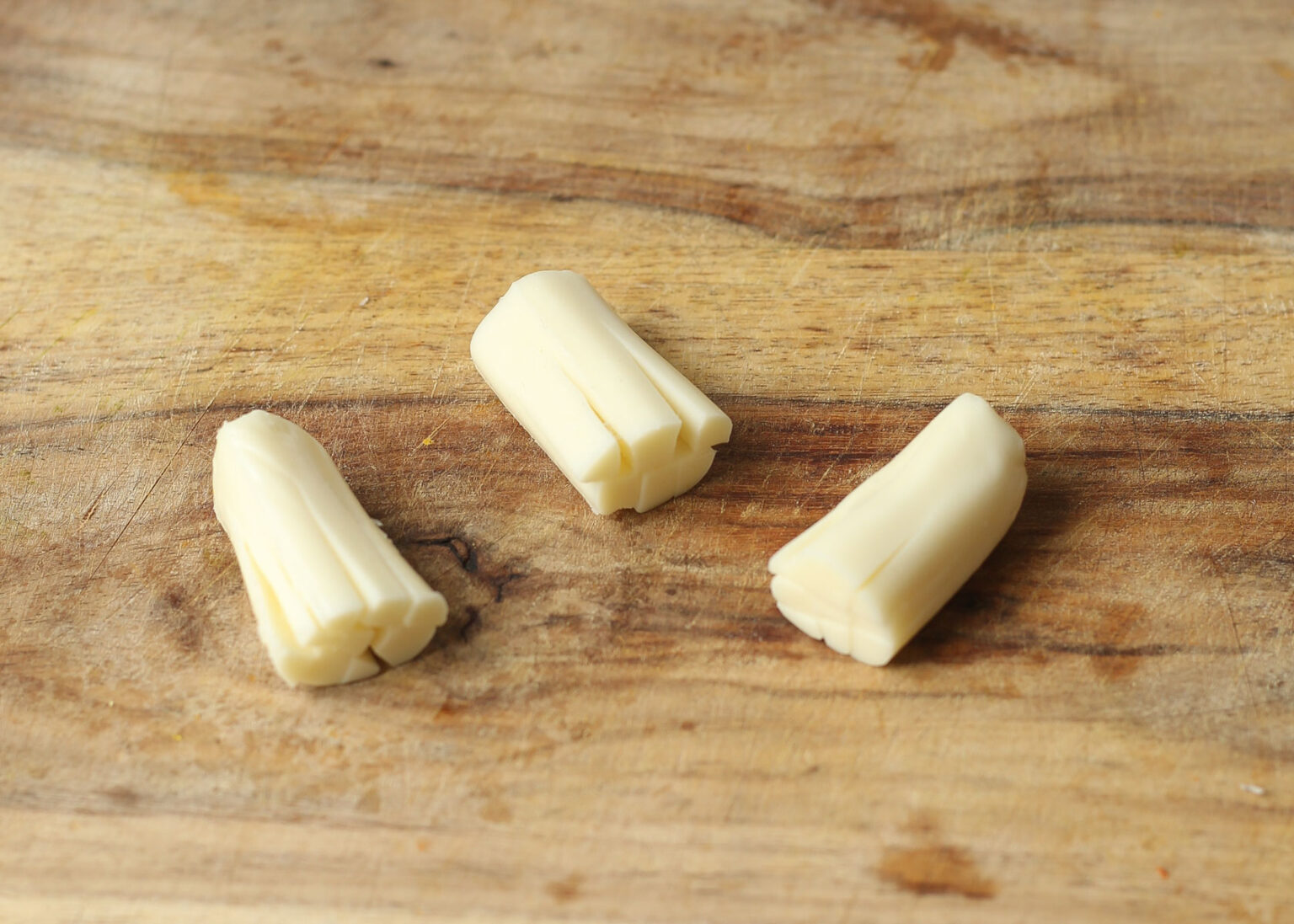 String Cheese Pretzel Broomsticks